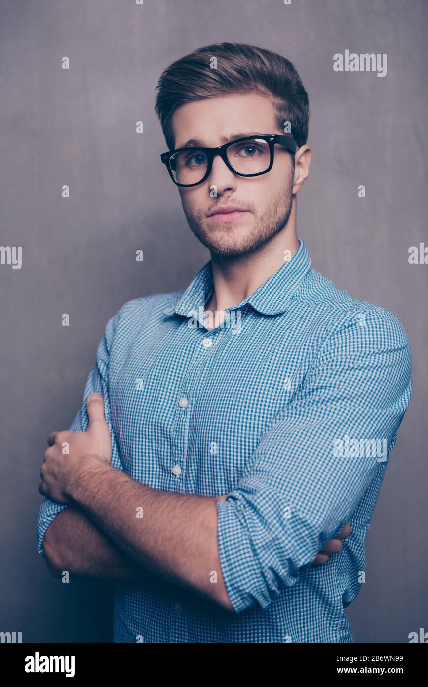 Confident young smart man in glasses with crossed hands Stock Photo - Alamy