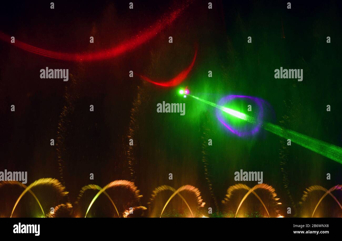 Colorful water fountains. Beautiful laser and fountains show. Large ...