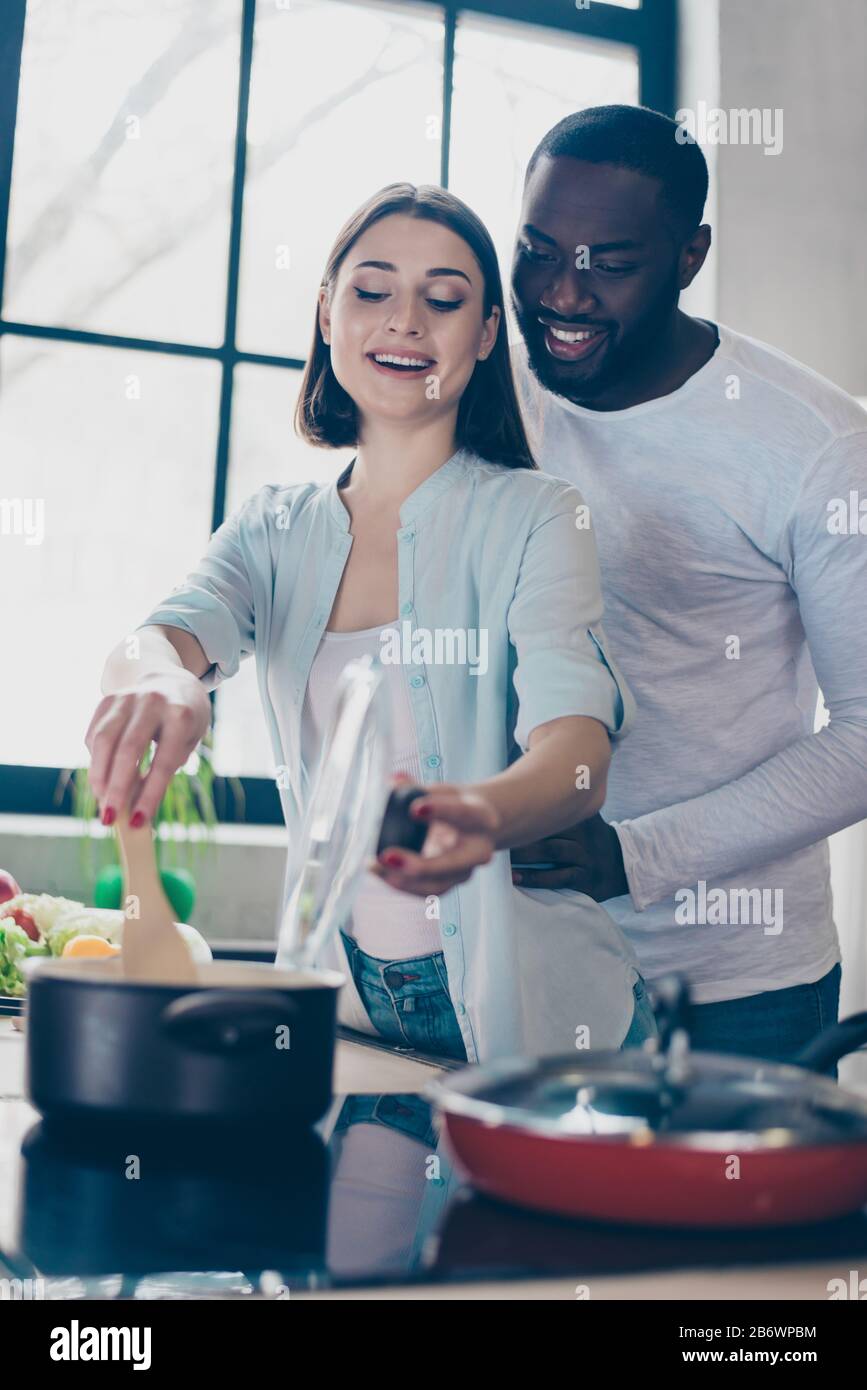 two lovely mixed race people together cooking healthy breakfast ...