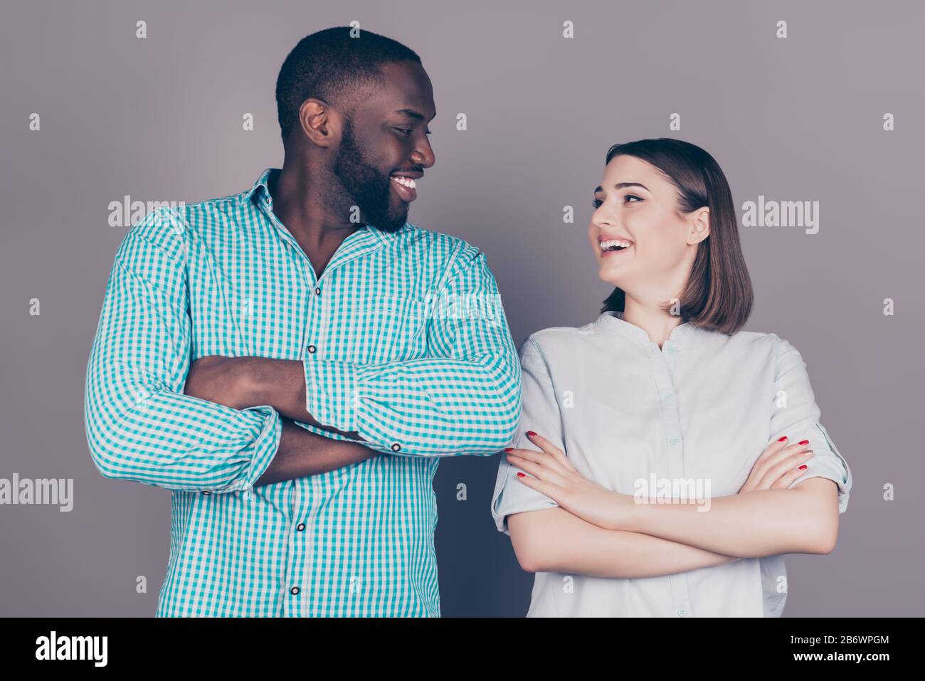 two mixed race people smiling. Handsome afro american guy standing ...