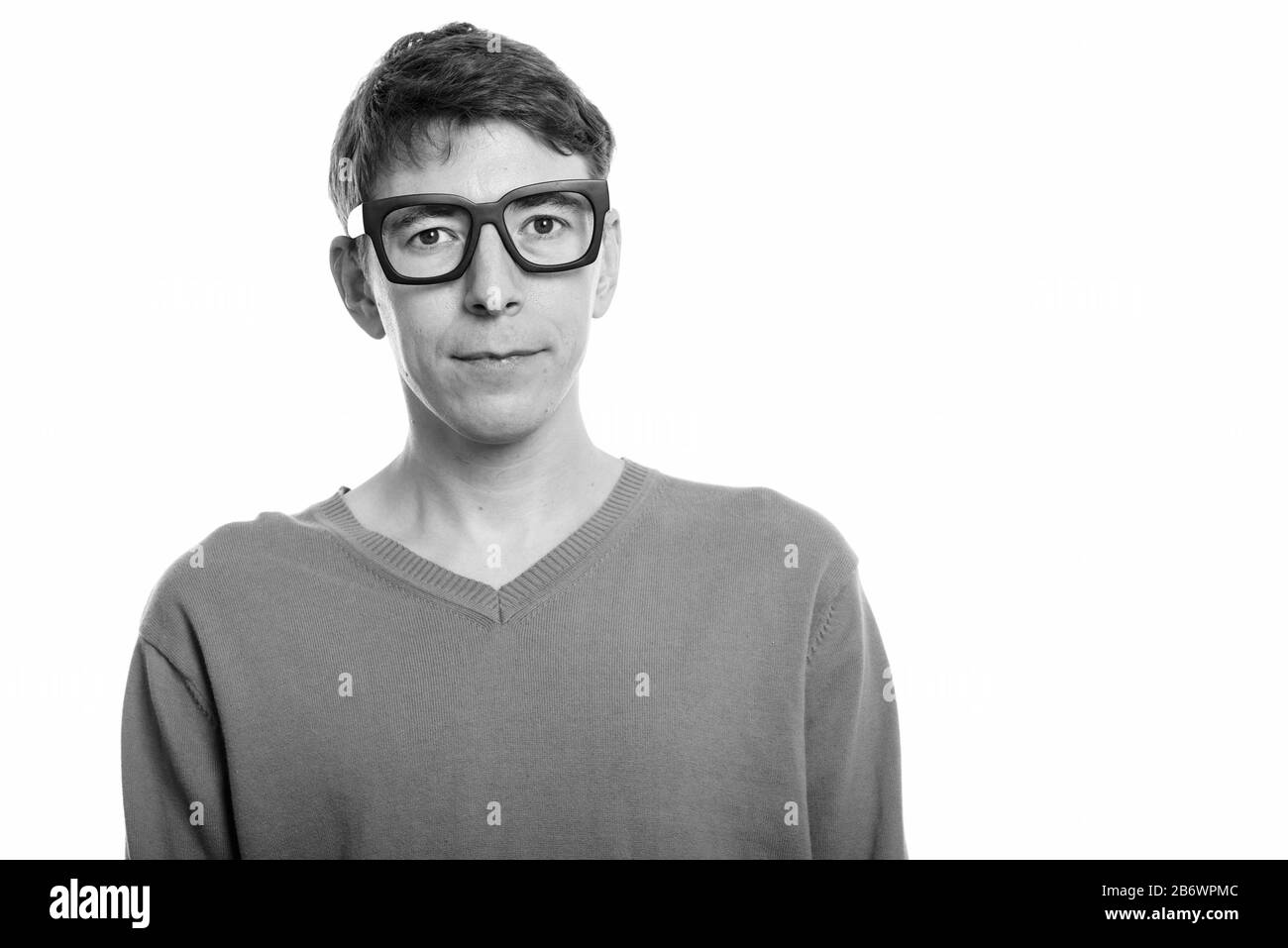 Face of nerd man with big eyeglasses looking at camera Stock Photo - Alamy