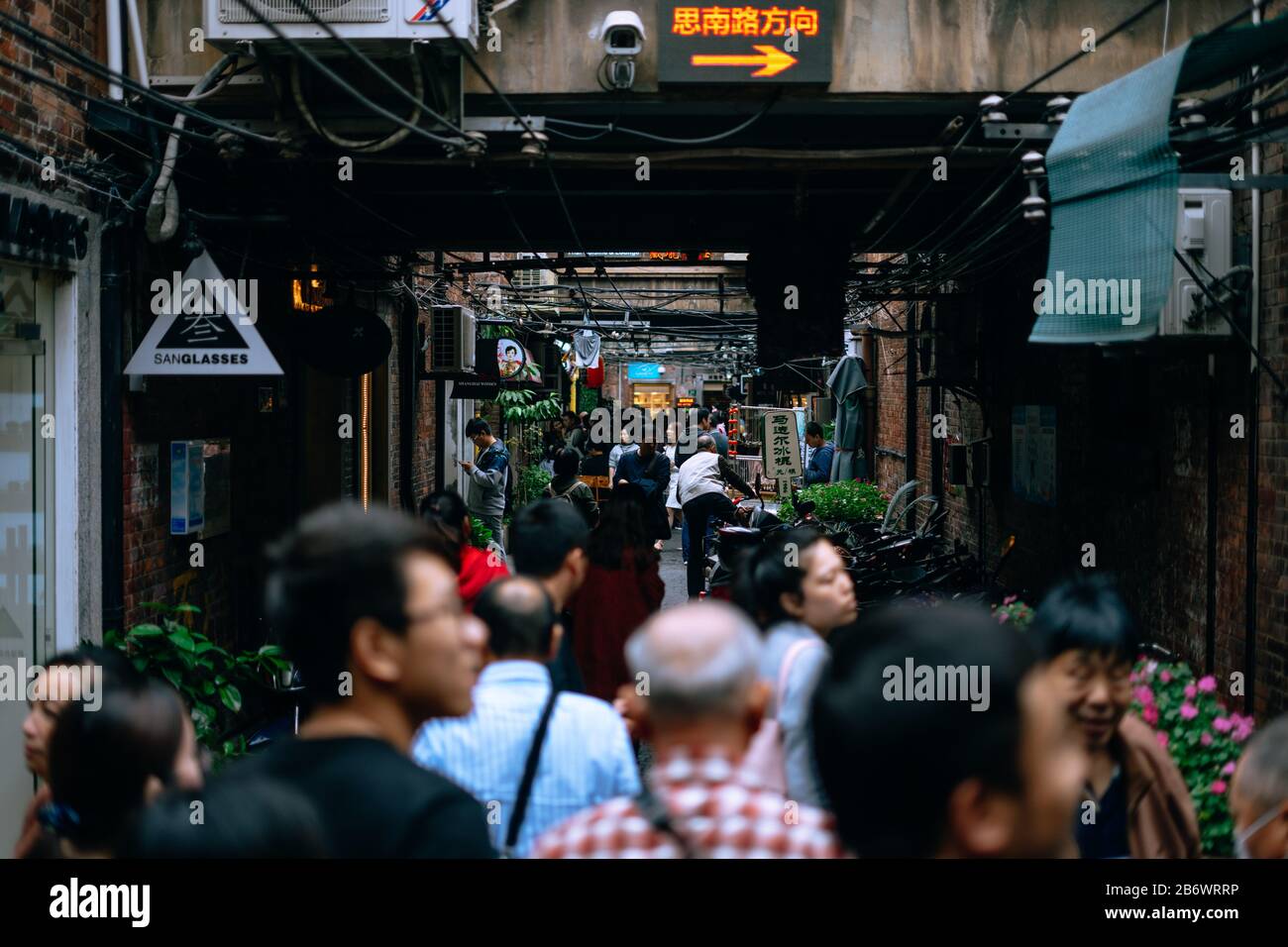 Shanghai, China; Nov 28 2017: People walking in chinese street market ...