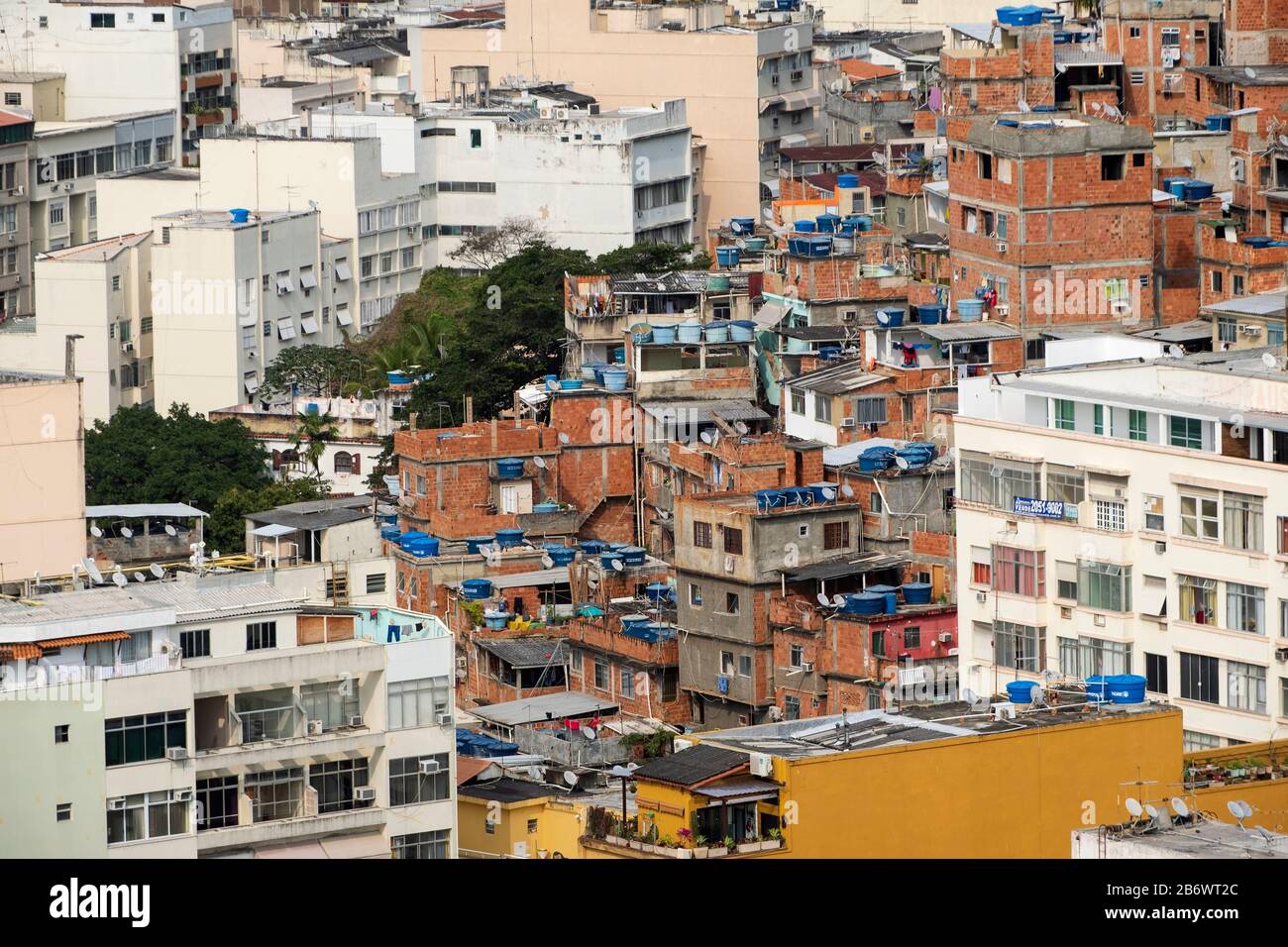 Brazil, Rio de Janeiro. Slum dwellings and middle class apartment ... Brazil, Rio de Janeiro. Slum dwellings and middle class apartment ...