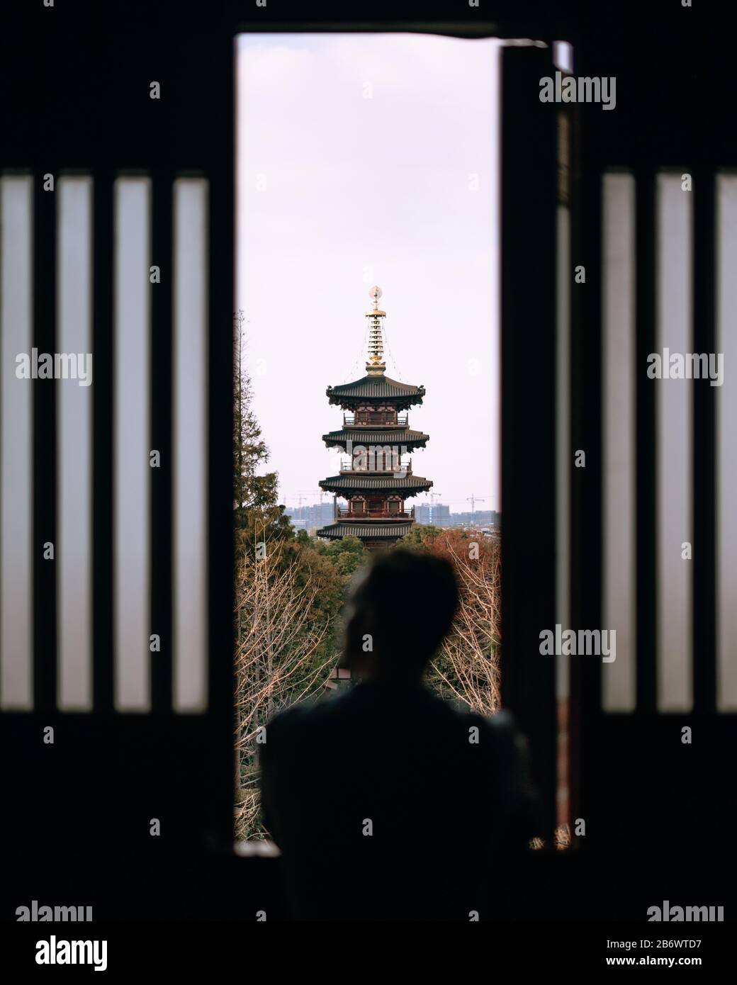 Chinese traditional temple with beautiful architecture viewed through a ...
