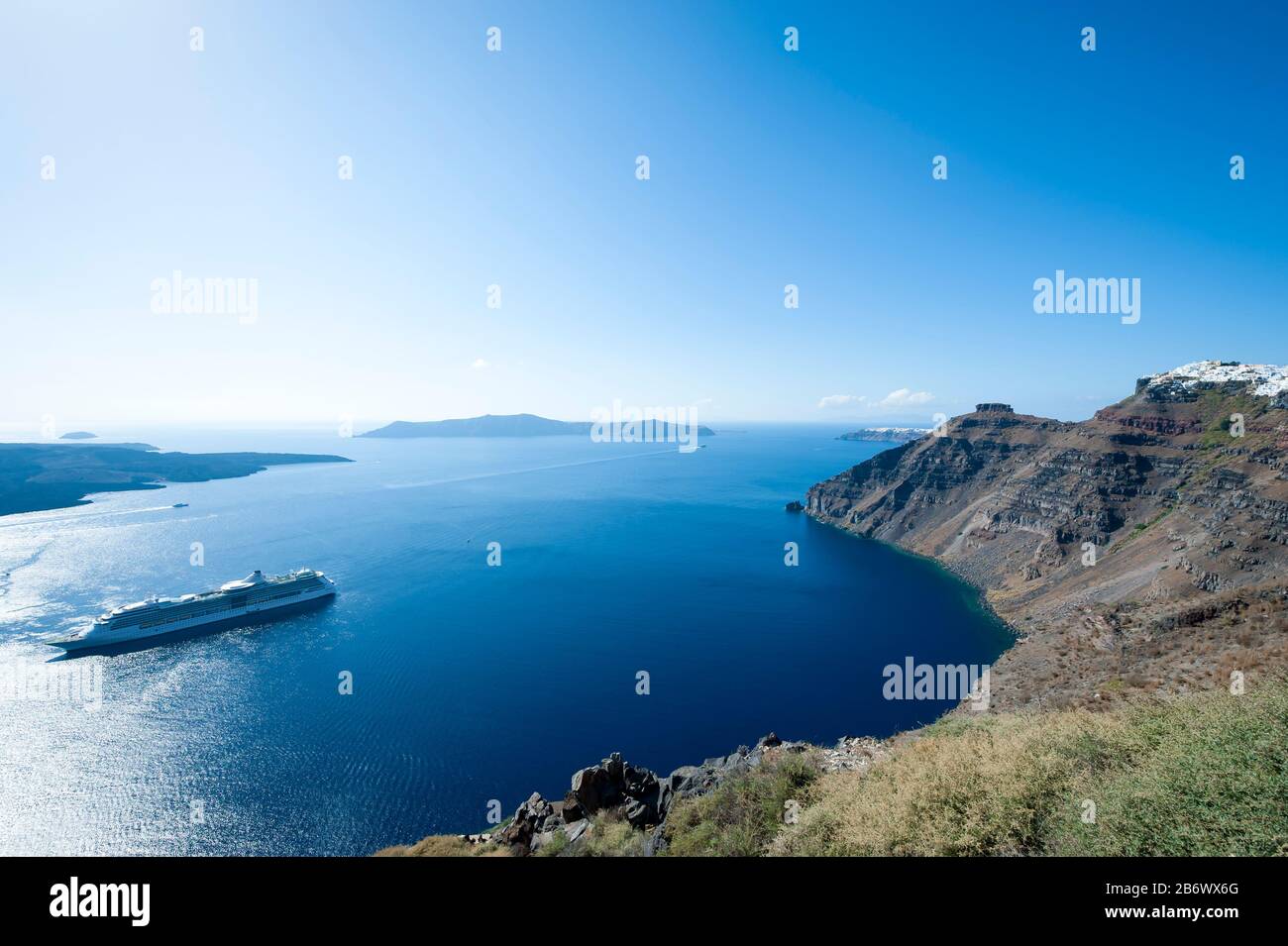 Bright scenic view of the dramatic Mediterranean caldera landscape from ...