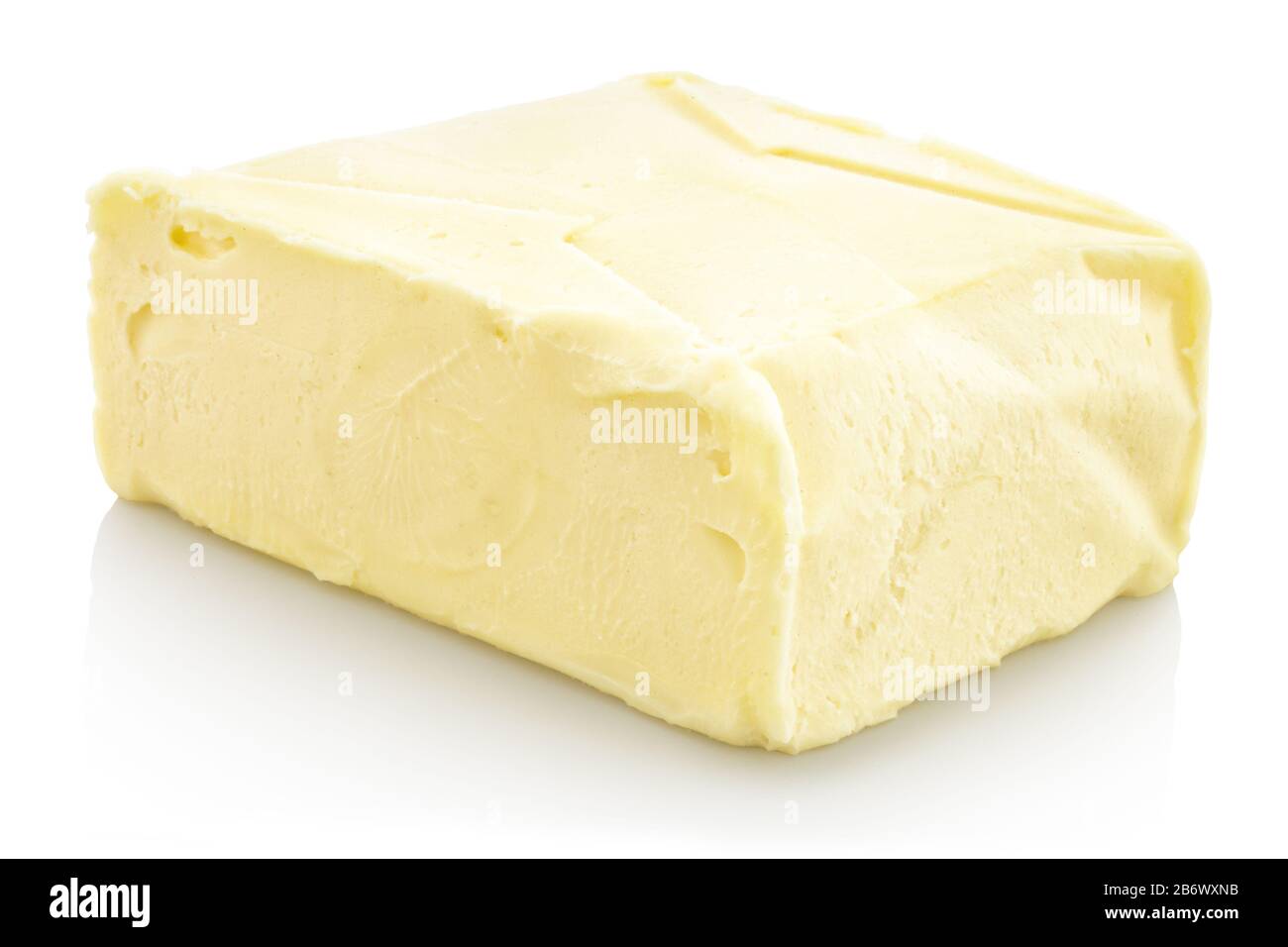 Fresh Block of Butter. Isolated on white background with shadow ...