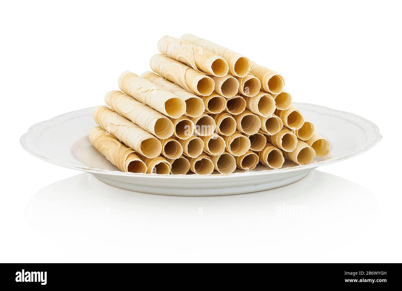 Christmas tube-shaped wafers on ceramic plate. In slovak called ...