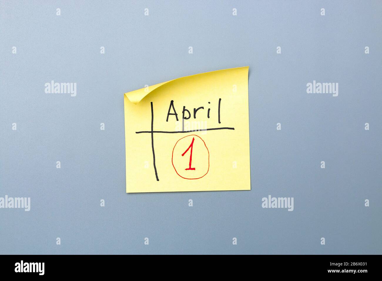 april fools day reminder on yellow sticky note. be aware and do not let ...