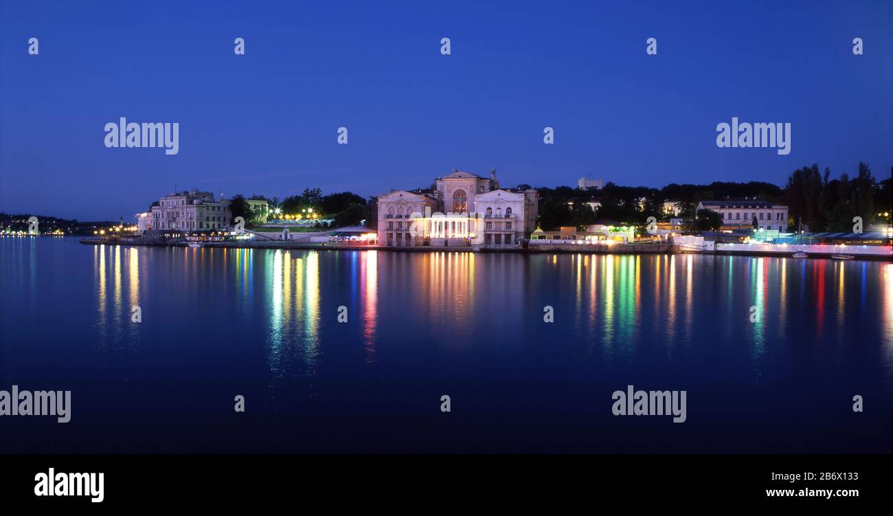 This is a night view from the sea of Sevastopol (Crimea). The town is ...