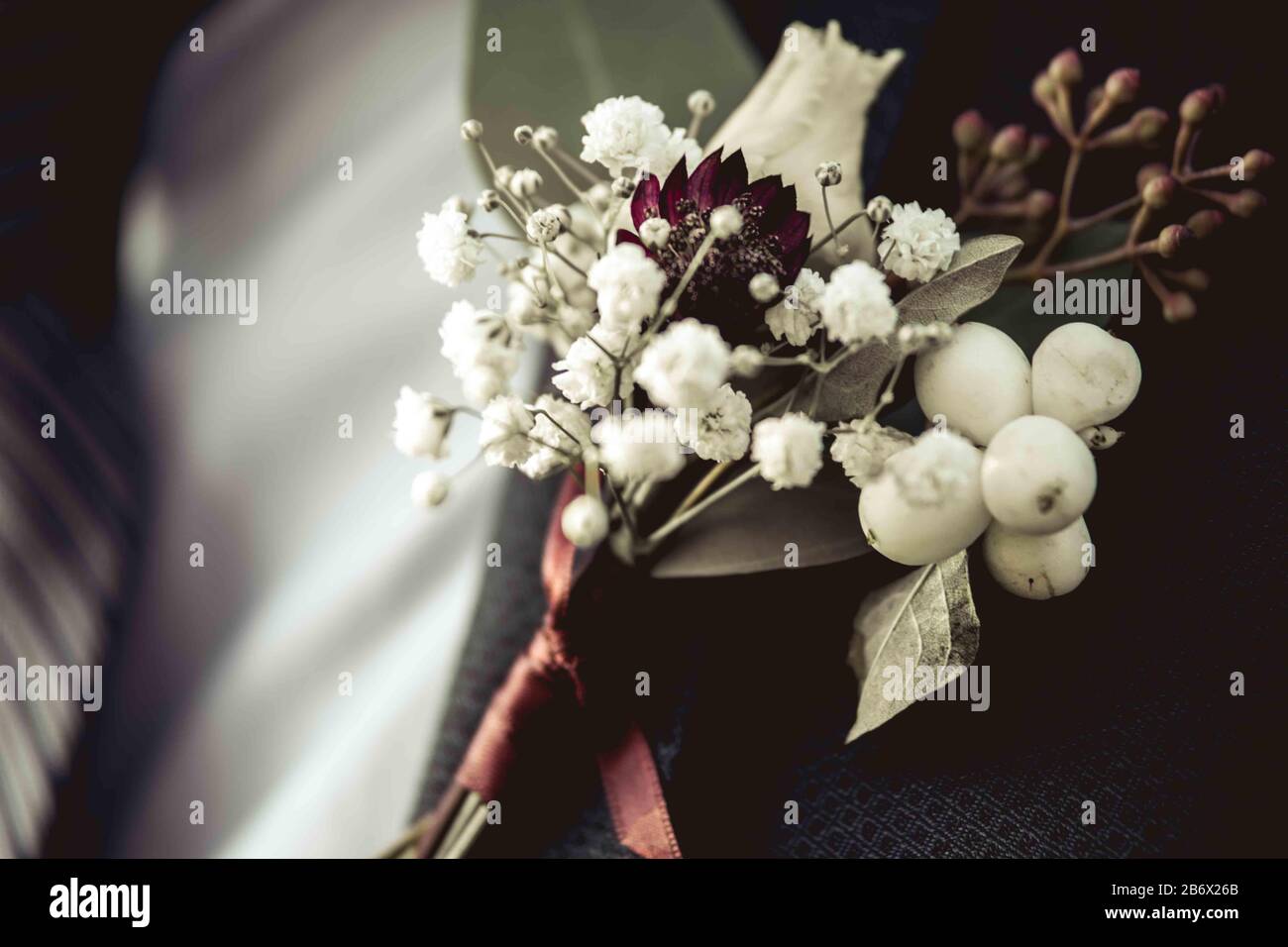 close up of buttonhole bouquet for jacket of groom Stock Photo - Alamy