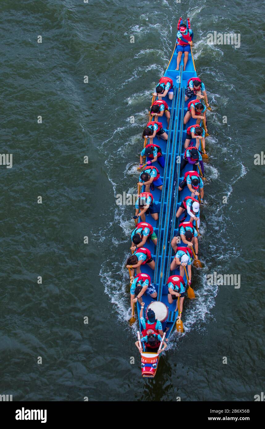 Dragonboat team racing during the 2019 Taipei Dragon Boat festival in ...