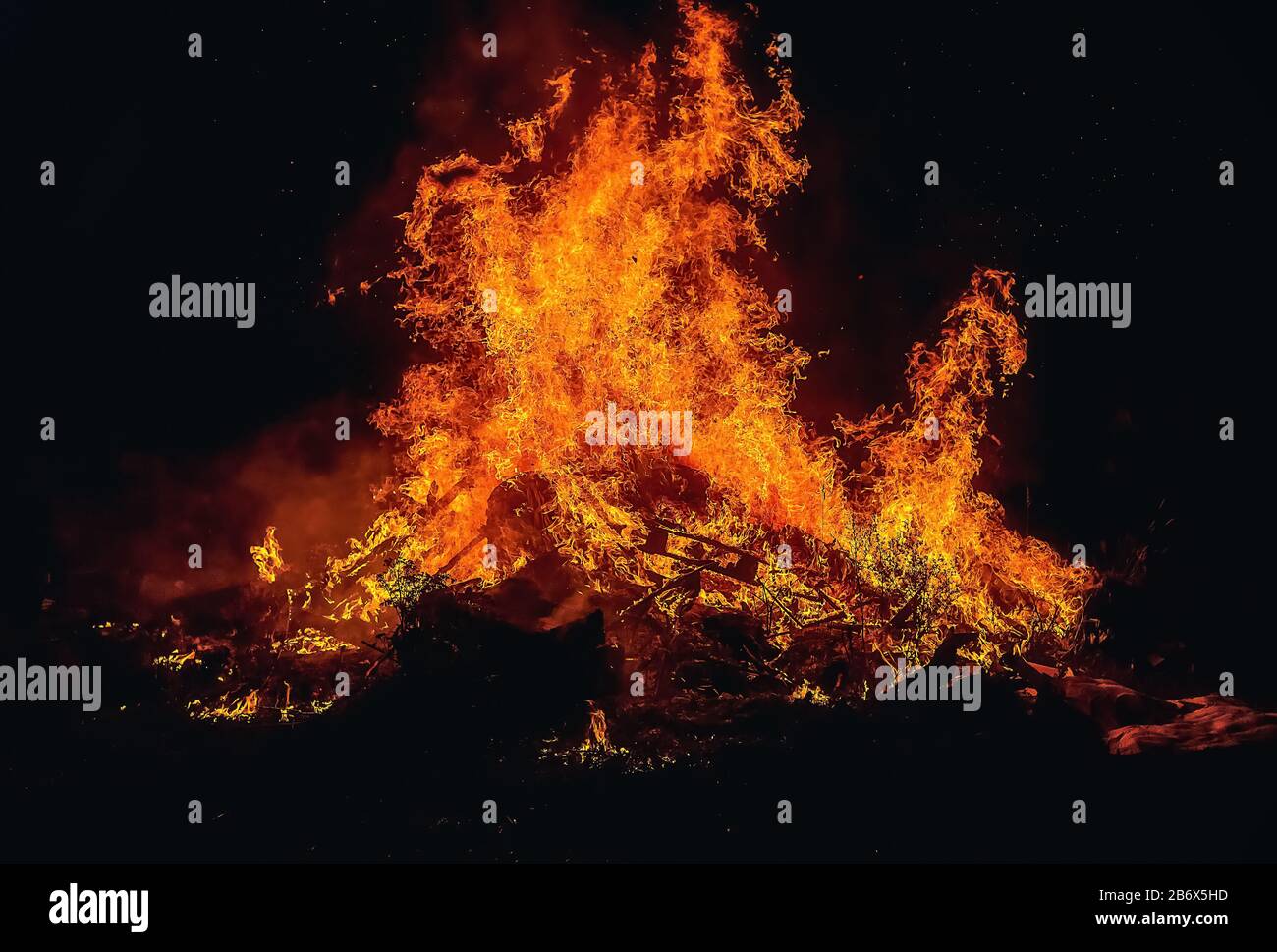 beautiful big fire on black night background Stock Photo - Alamy