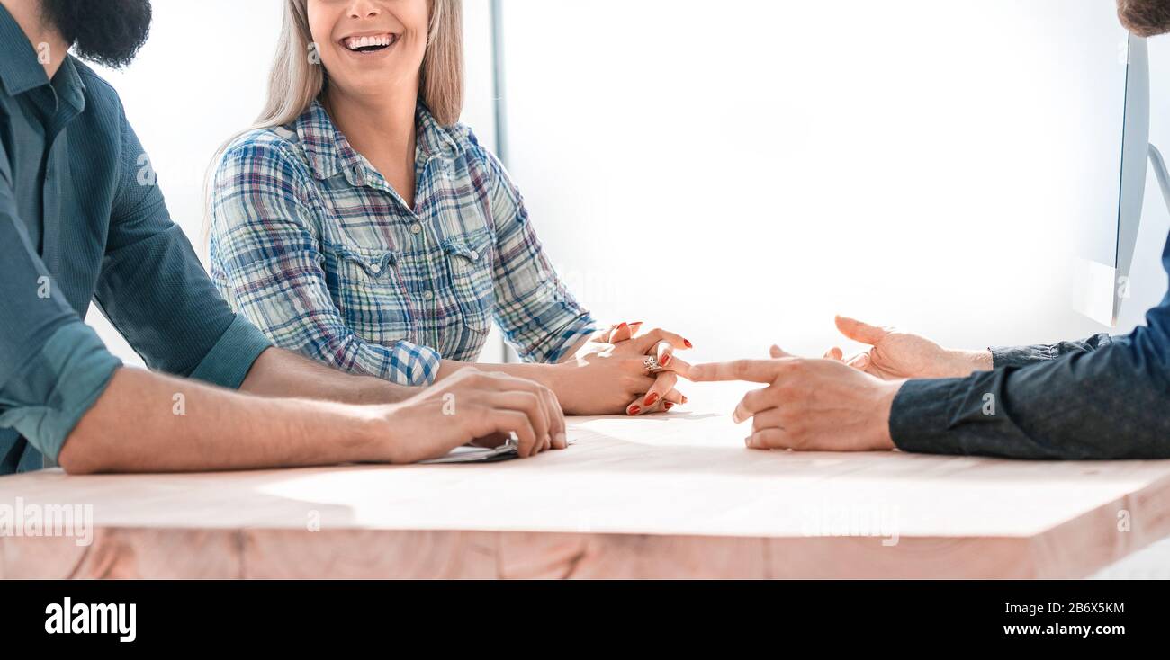 business team discussing current tasks at the desktop. teamwork Stock ...