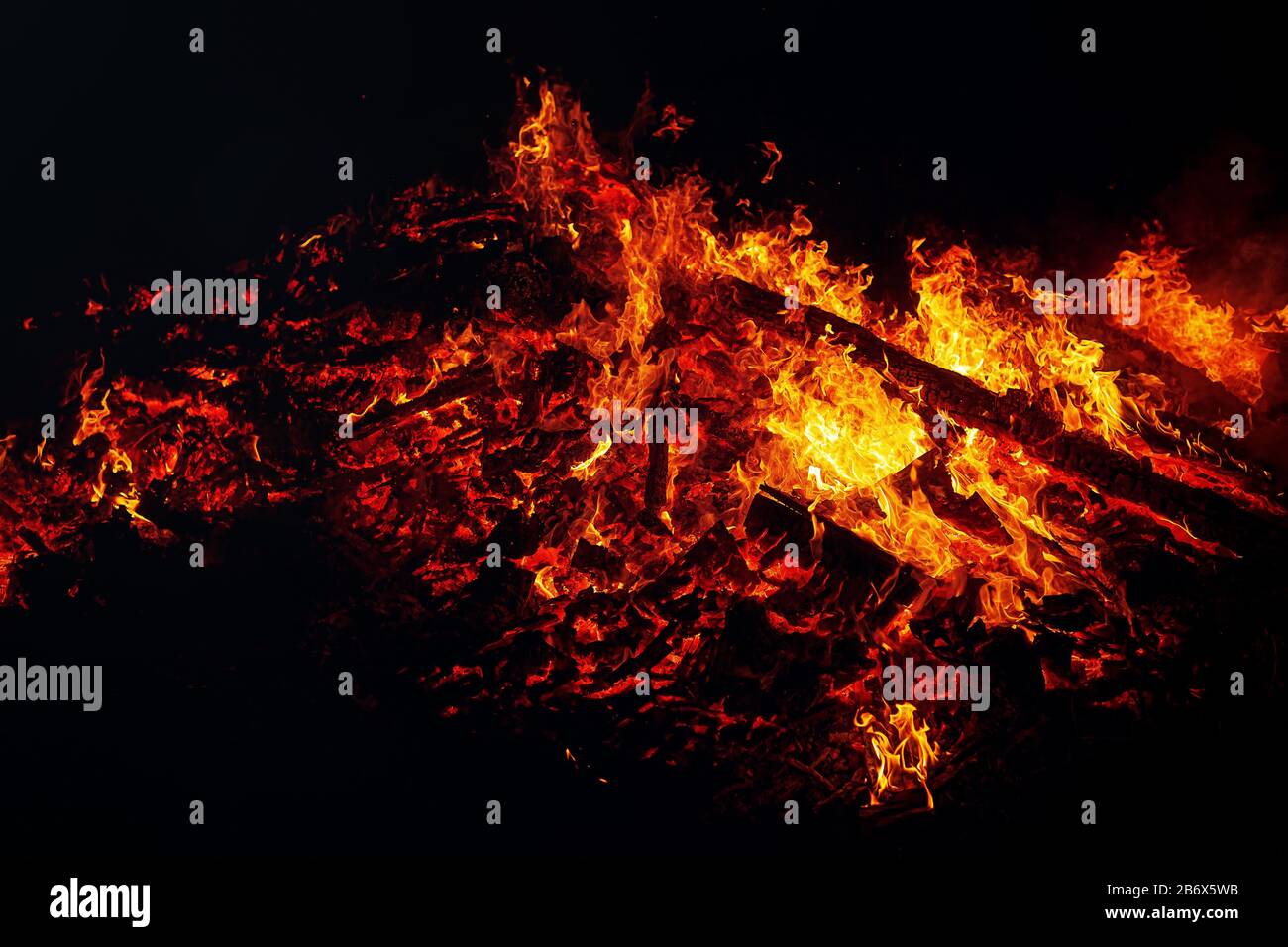 beautiful big fire on black night background Stock Photo - Alamy