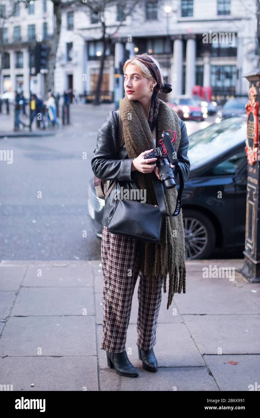 LONDON, UK- febryary 15 2020: Fashionable people on the street . Street ...
