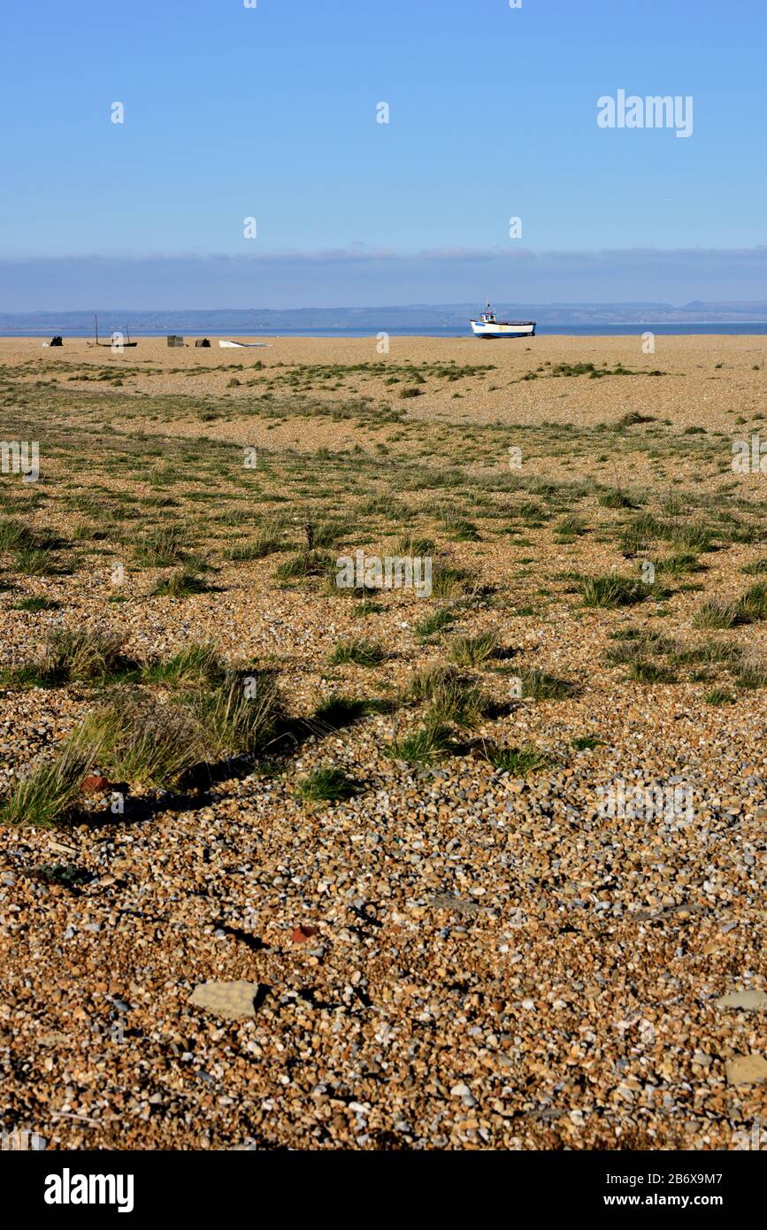 A long view of the shingle desert at Dungeness in Kent Stock Photo - Alamy
