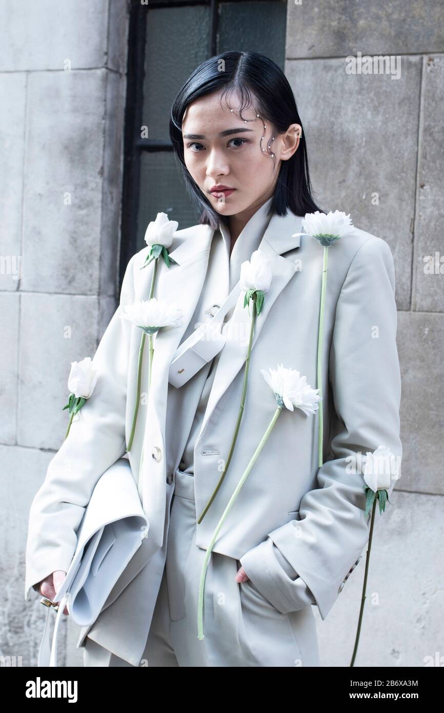 Asian woman in white boots hi-res stock photography and images - Alamy