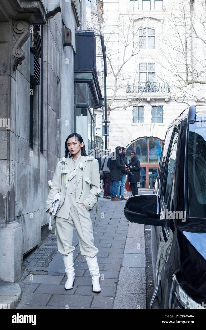 Asian woman in white boots hi-res stock photography and images - Alamy