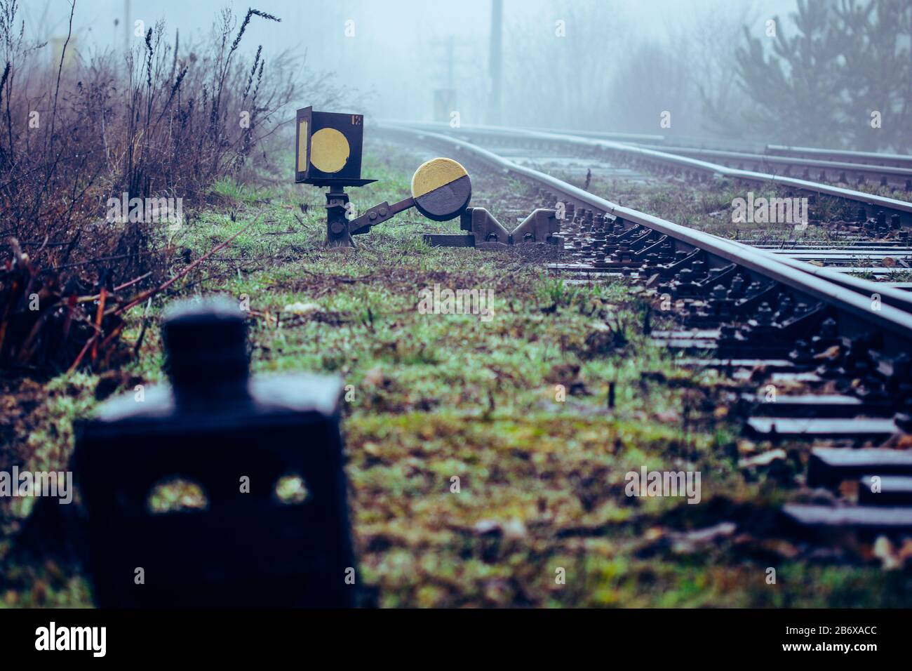 Railroad Track Switches at railway junction in front defocused derailer ...