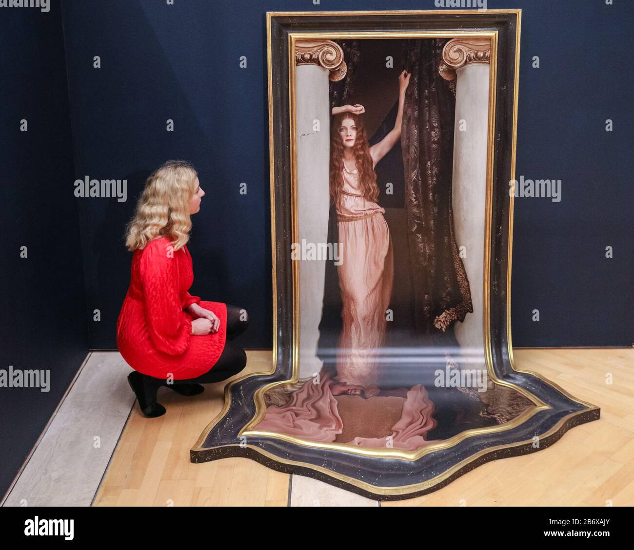 London, UK. 12th Mar, 2020. An assistant poses with Maisie Broadhead's ...