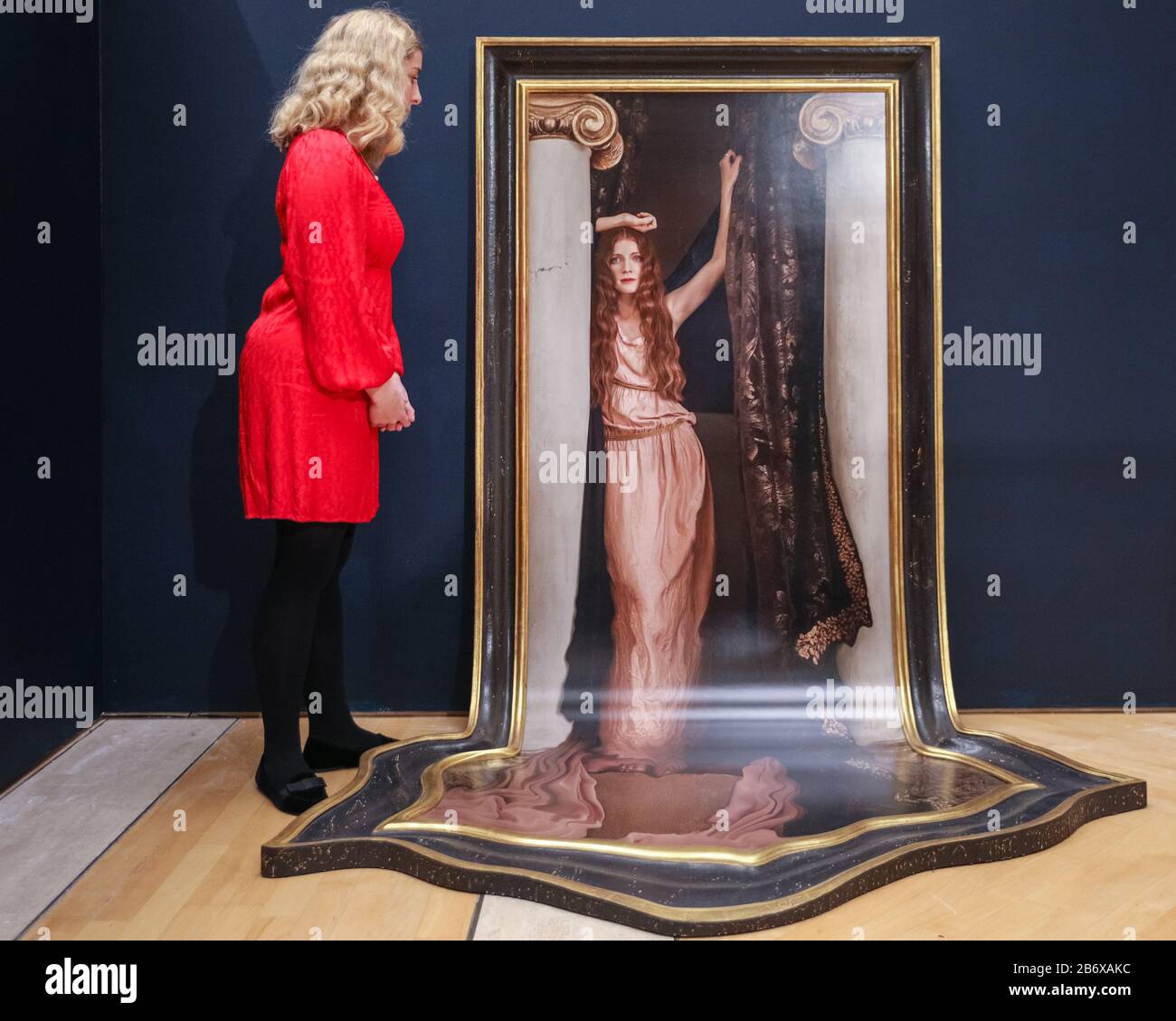 London, UK. 12th Mar, 2020. An assistant poses with Maisie Broadhead's ...