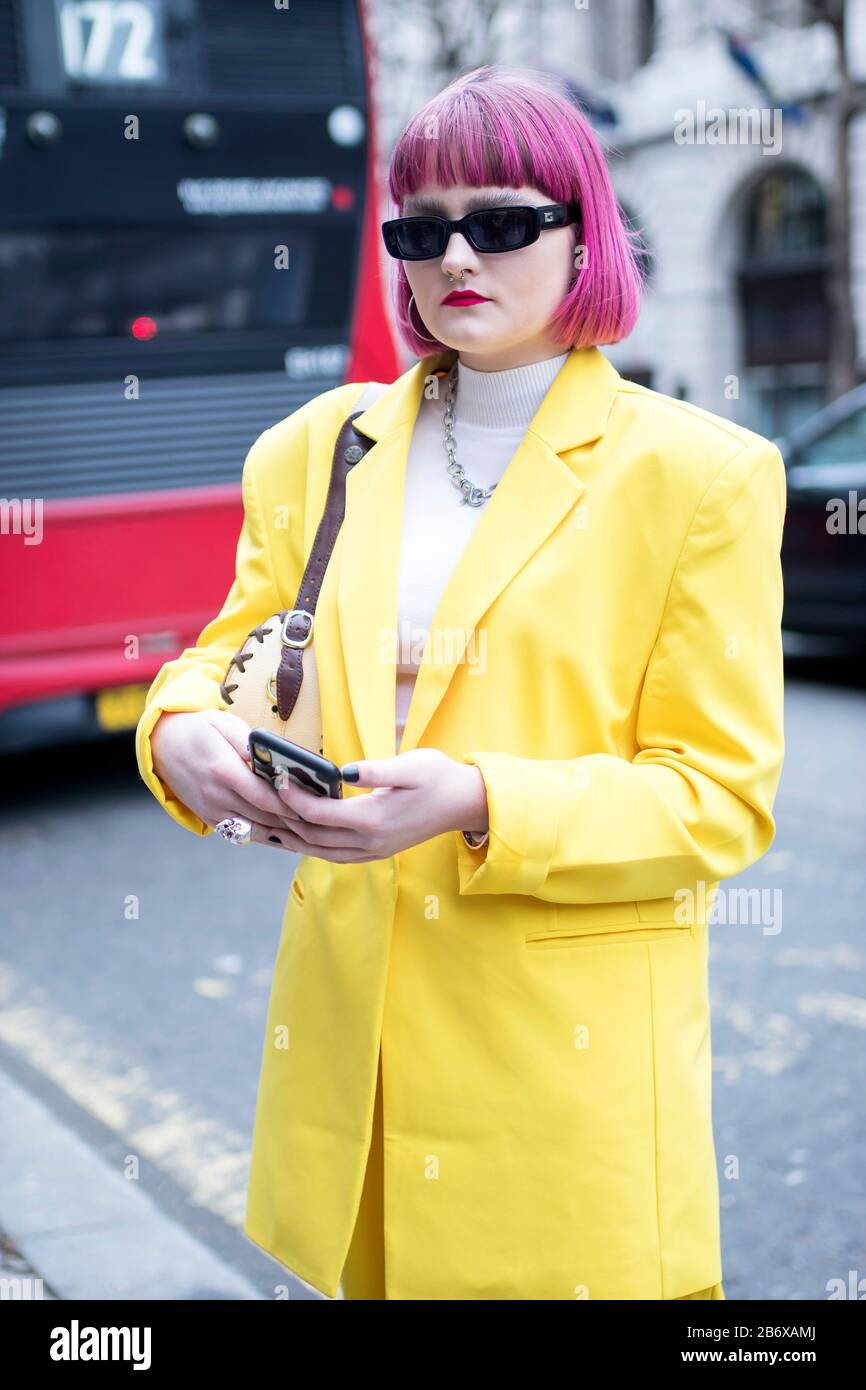 LONDON, UK- febryary 15 2020: Fashionable people on the street . Street ...