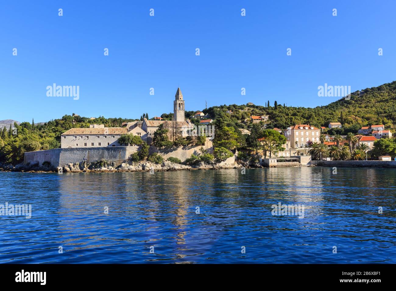The port and Franciscan monastery church of the small holiday island of ...