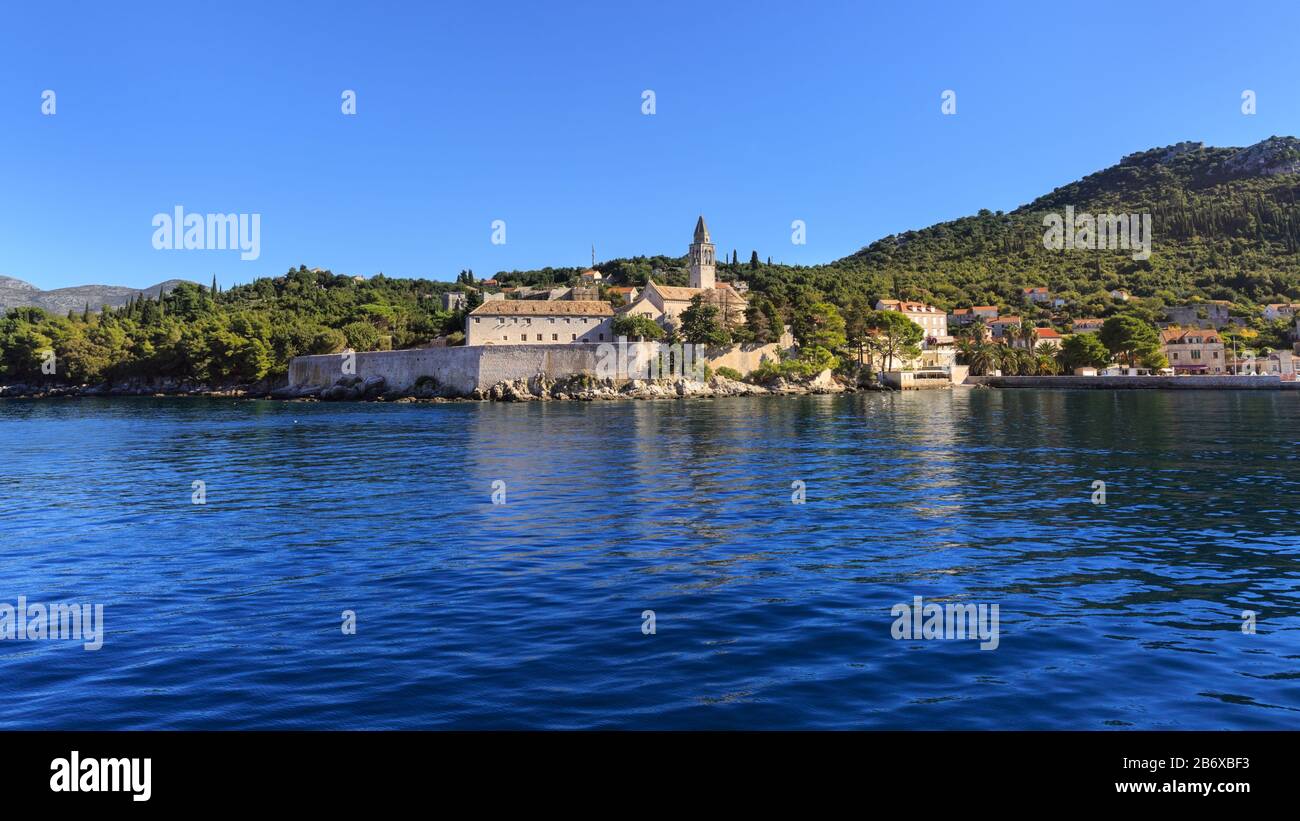 The port and Franciscan monastery church of the small holiday island of ...