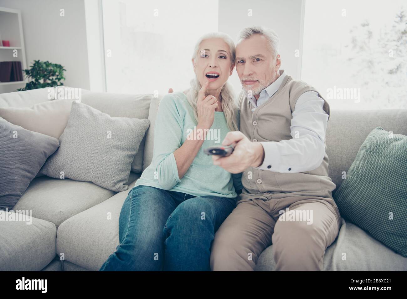 Family of two aged people pair spending free time together changing ...