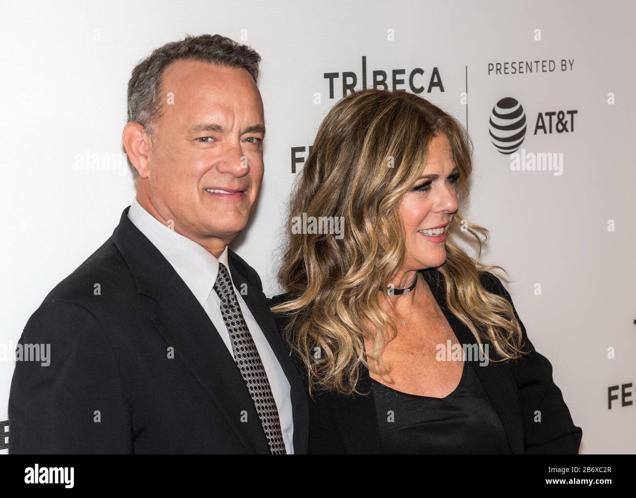 Actor Tom Hanks arrives with his wife Rita Wilson to attend the World ...