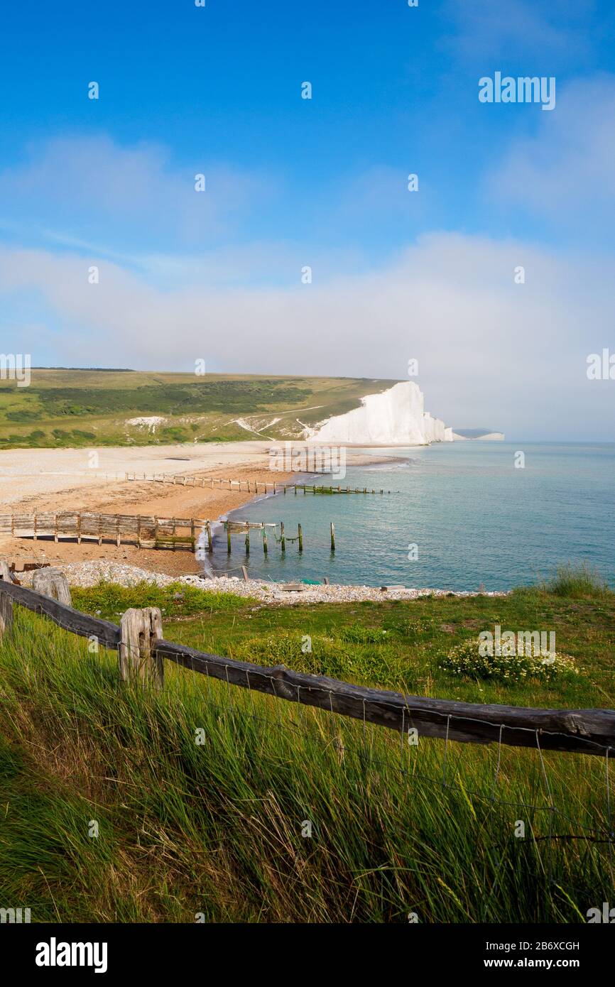 View of a path leading to the Seven Sisters Chalk Cliffs at the coast ...