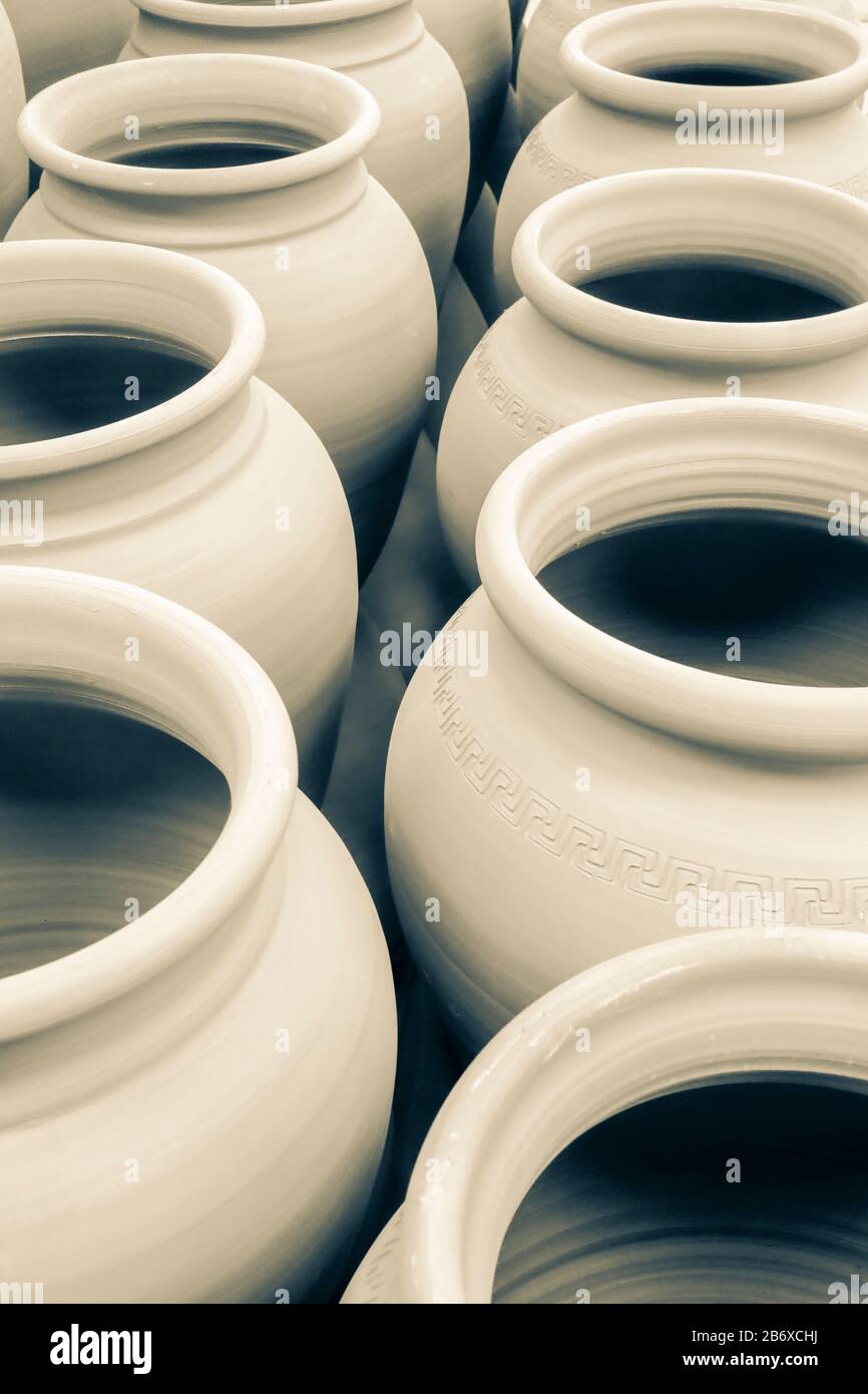 Clay pots with Grecian style motif Stock Photo - Alamy