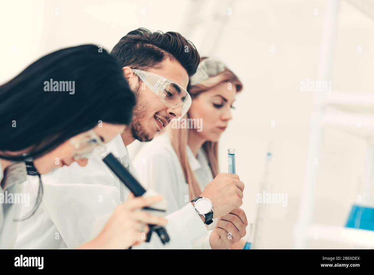 Conduct experiments in laboratory chemical hi-res stock photography and ...