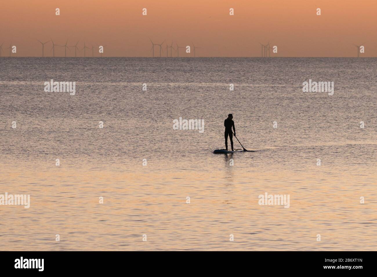 Wind farm at sunset hi-res stock photography and images - Alamy