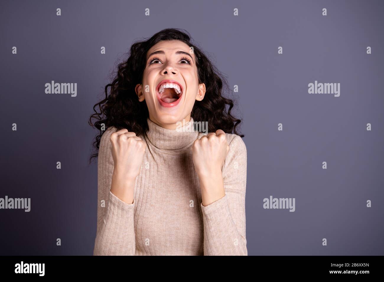 Close up photo beautiful she her lady ecstatic hands arms fists raised ...