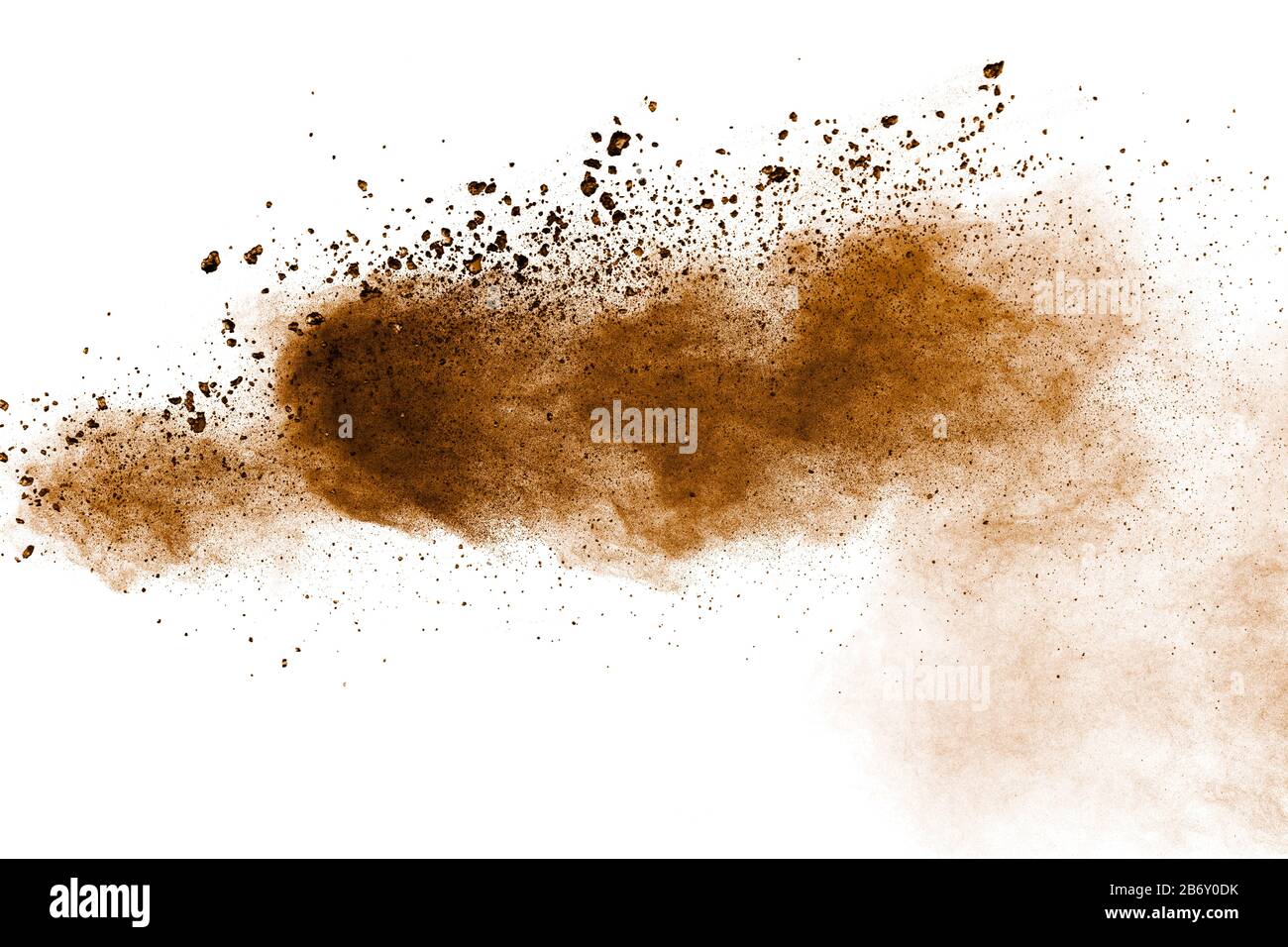 Brown powder dust cloud.Brown particles splattered on white background ...