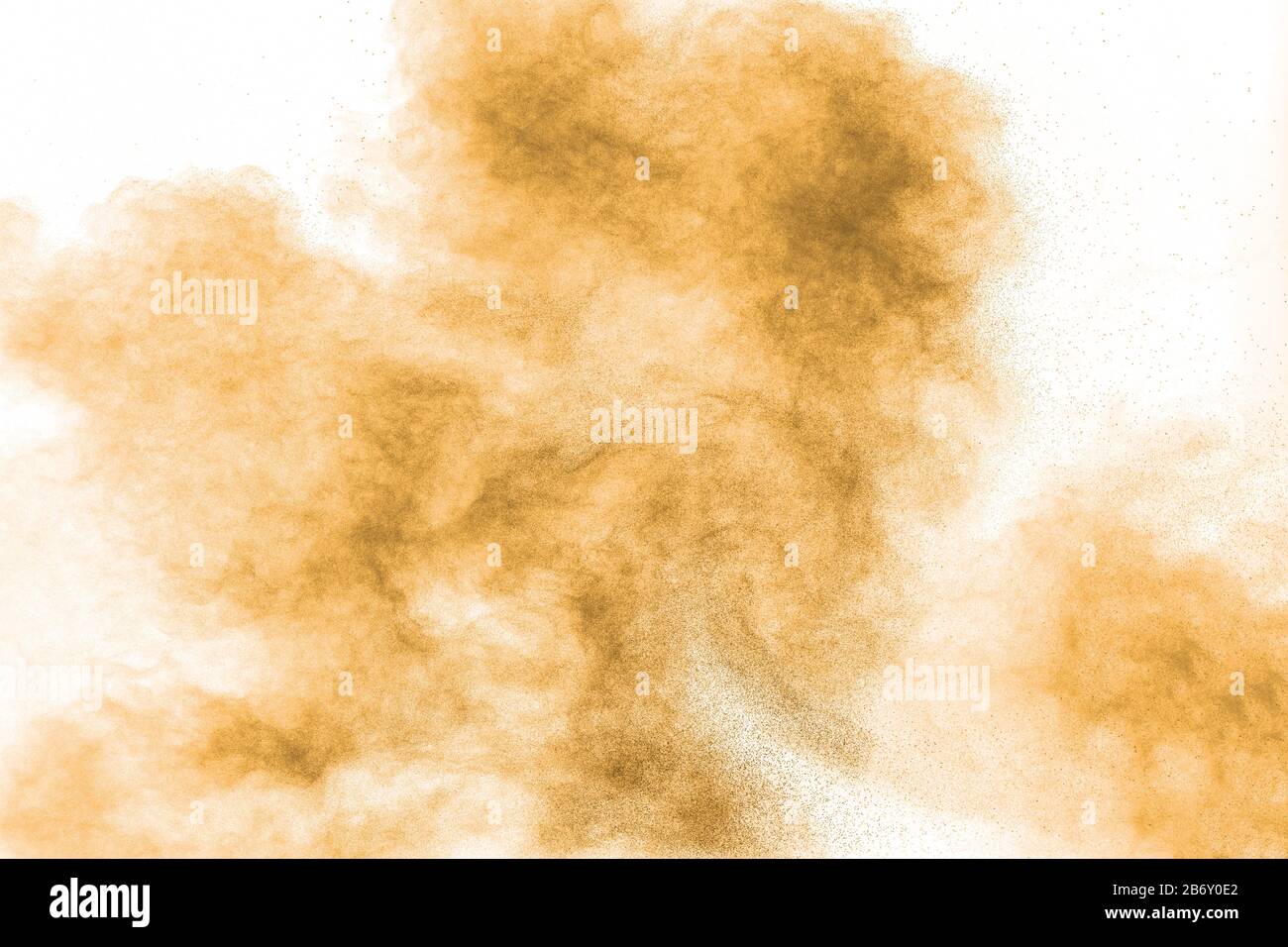 Brown powder dust cloud.Brown particles splattered on white background ...