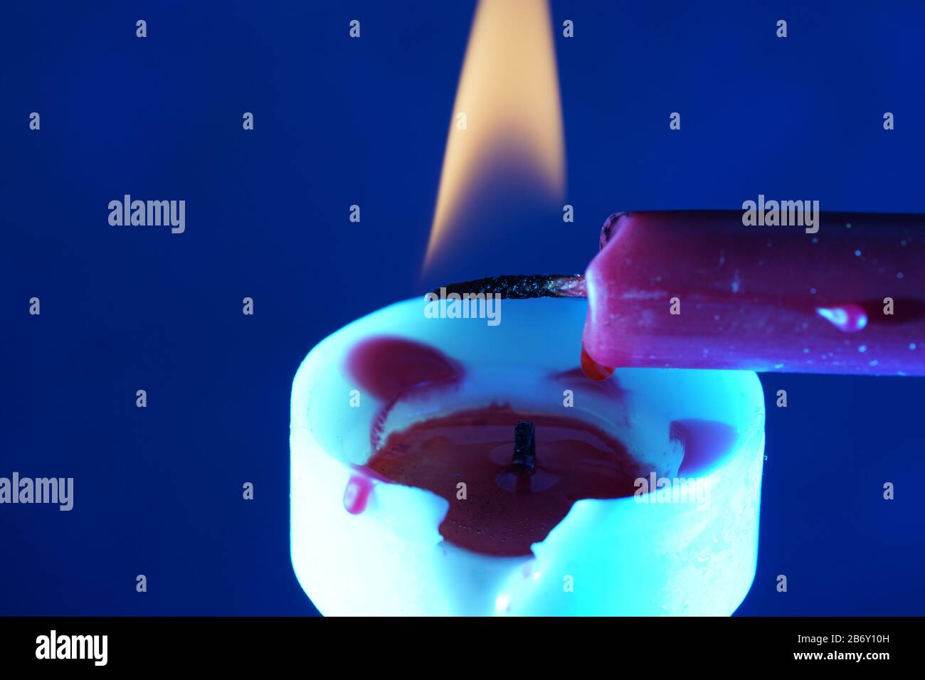 Candles with wax dripping photographed in the studio Stock Photo - Alamy