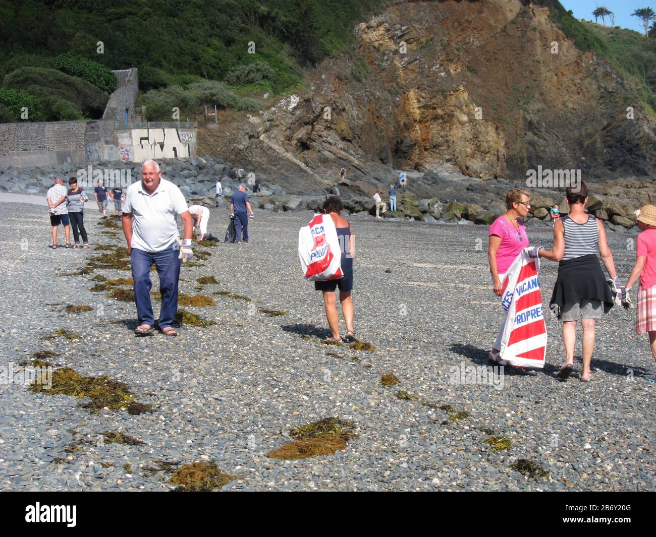 France beach collecting garbage hi-res stock photography and images - Alamy