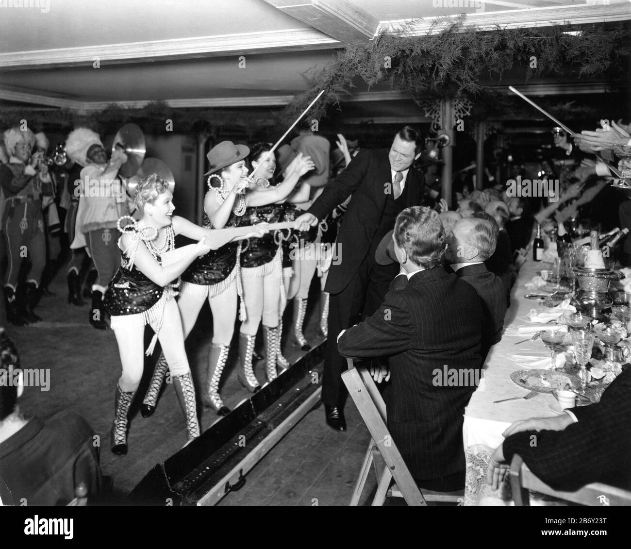 ORSON WELLES as Charles Foster Kane with showgirls during Inquirer ...