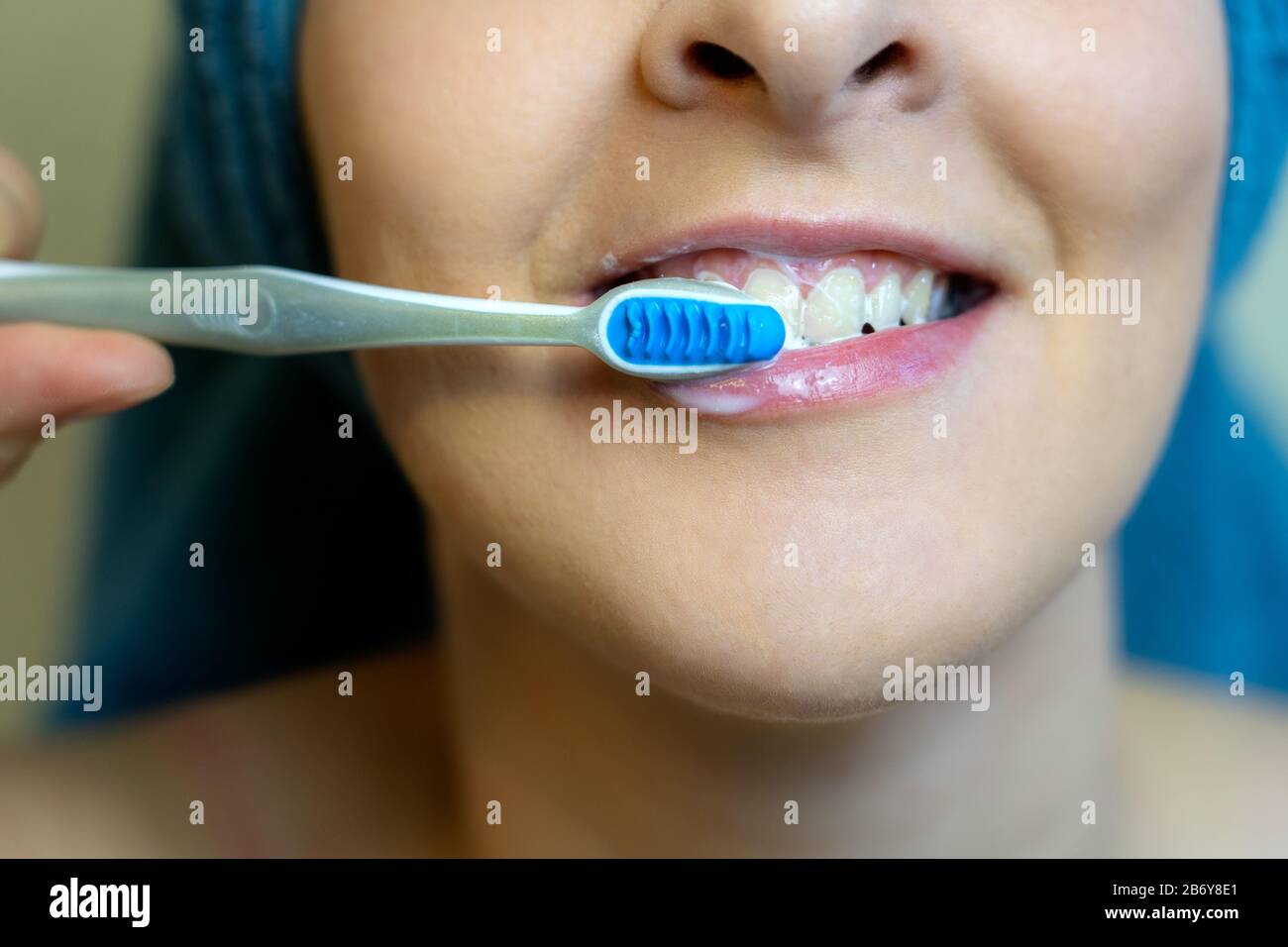 woman really washing her teeth after shower daily routine Stock Photo ...