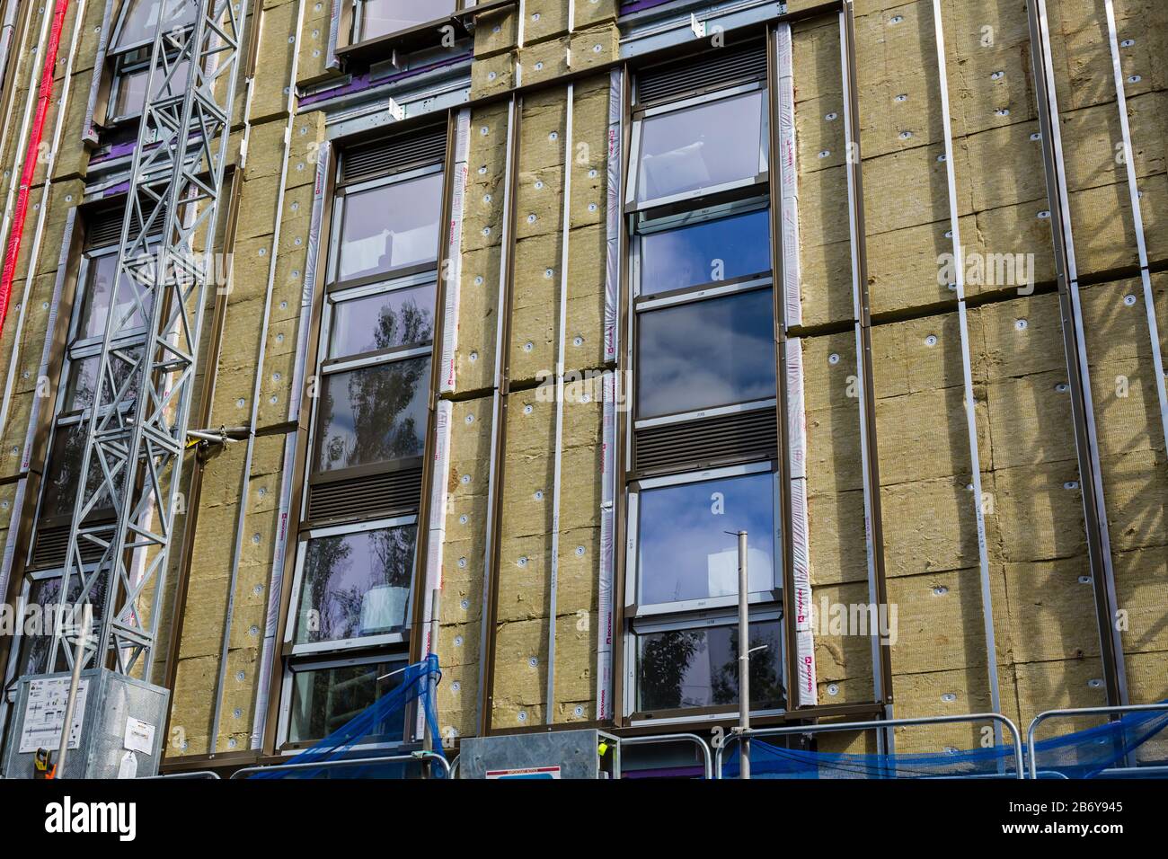 Insulation applied to the exterior of a new building in Glasgow ...