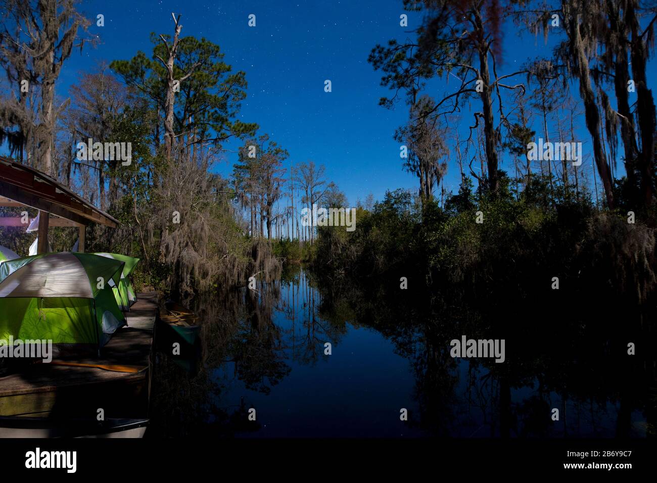 Campsite for canoe camping at night in the Okefenokee Swamp of Georgia ...