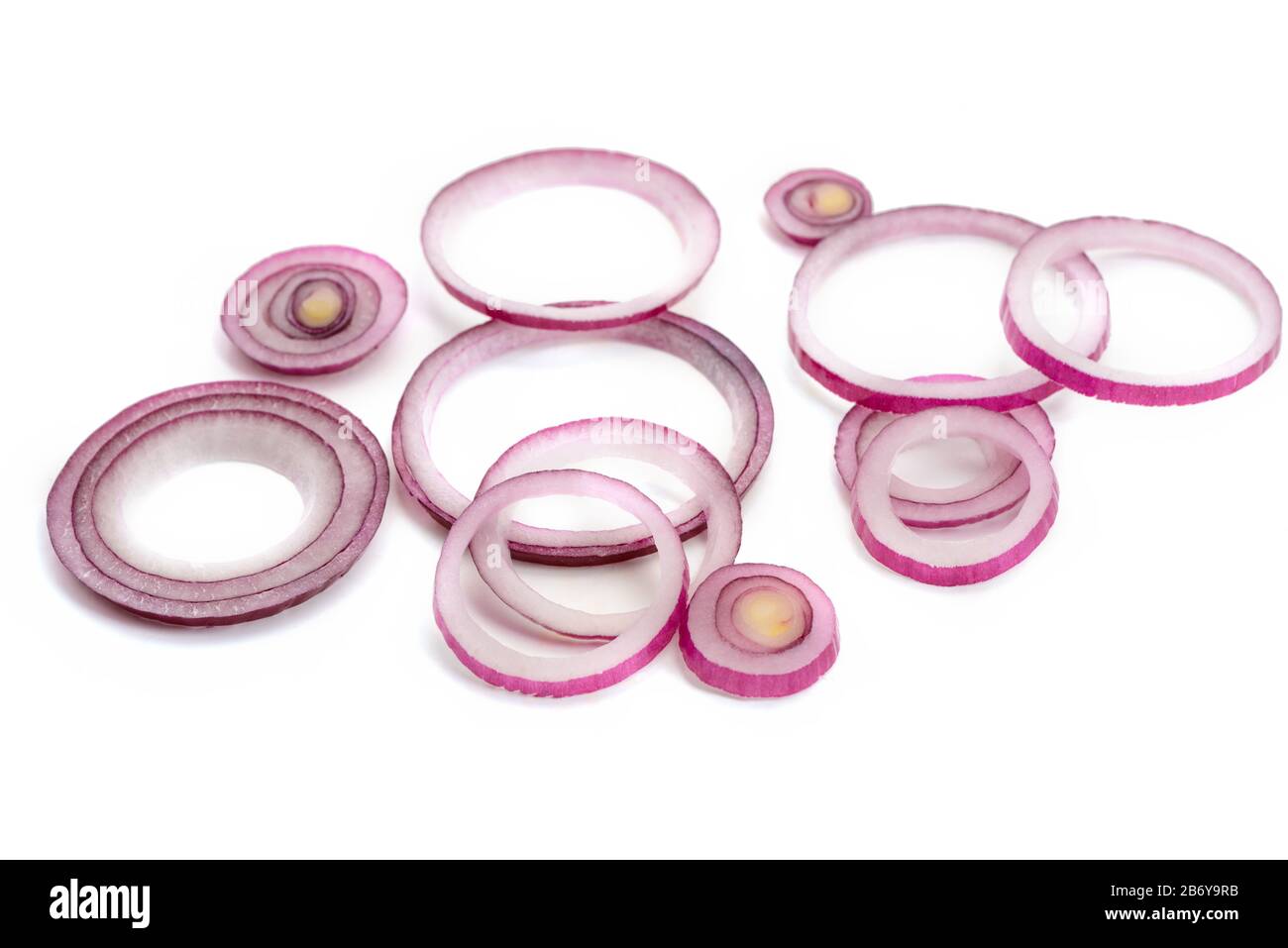 Fresh red onion rings on white background Stock Photo - Alamy