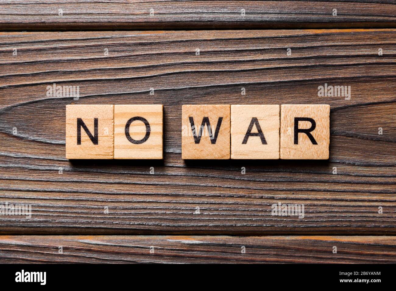 No war word written on wood block. No war text on table, concept Stock ...