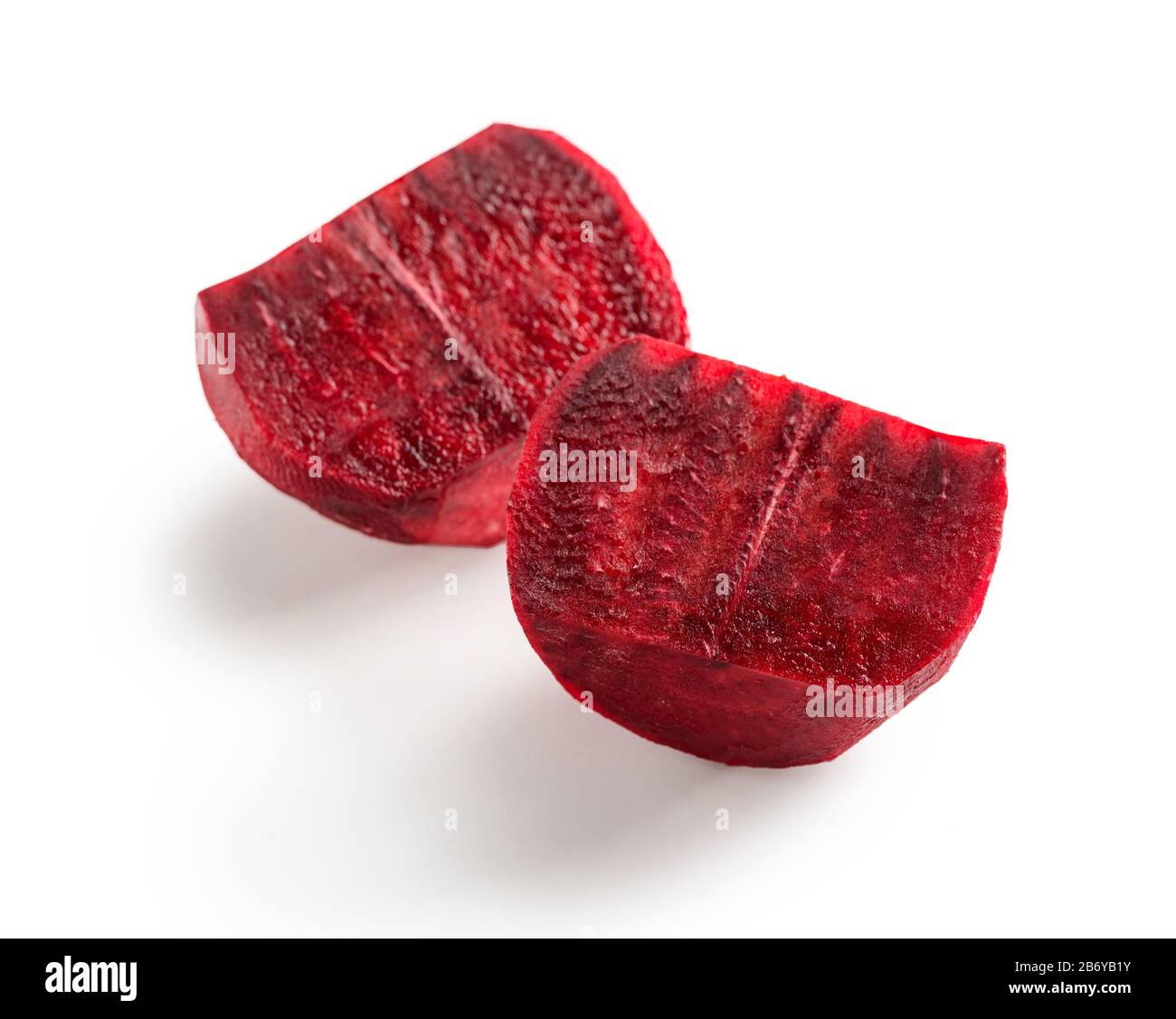 Peeled and halved beetroot on white background Stock Photo - Alamy