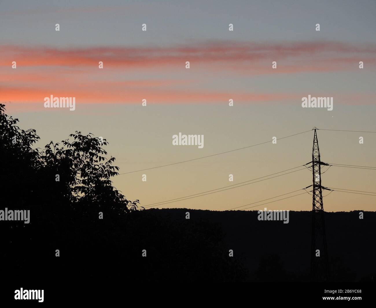 Morning red sky near power lines Stock Photo - Alamy