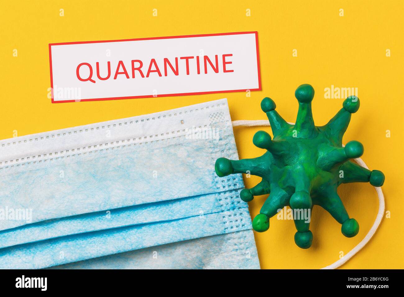 Medical mask, tag with the inscription and layout of the coronovirus ...