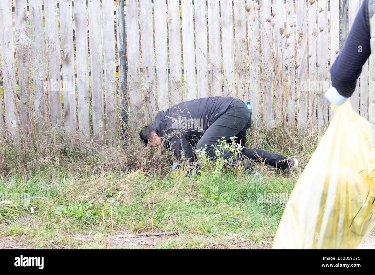 Man littering hi-res stock photography and images - Alamy