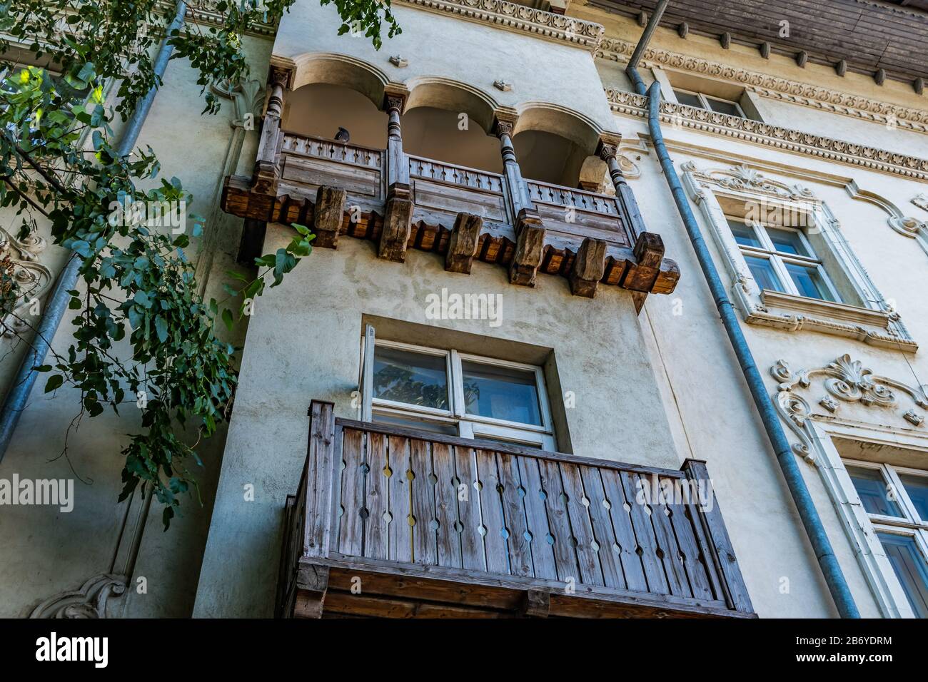 Balconies on an old hospital facade Stock Photo - Alamy